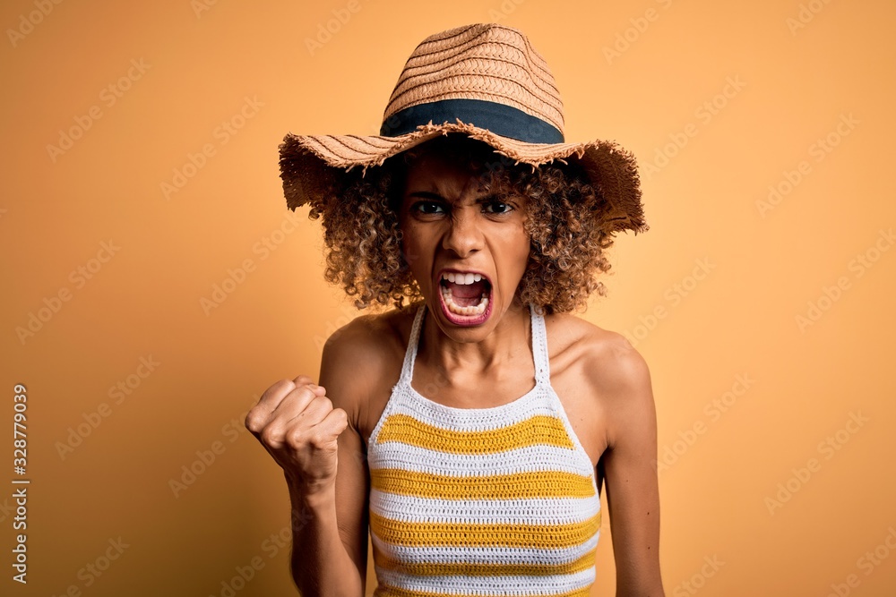 African american tourist woman with curly on vacation wearing summer ...