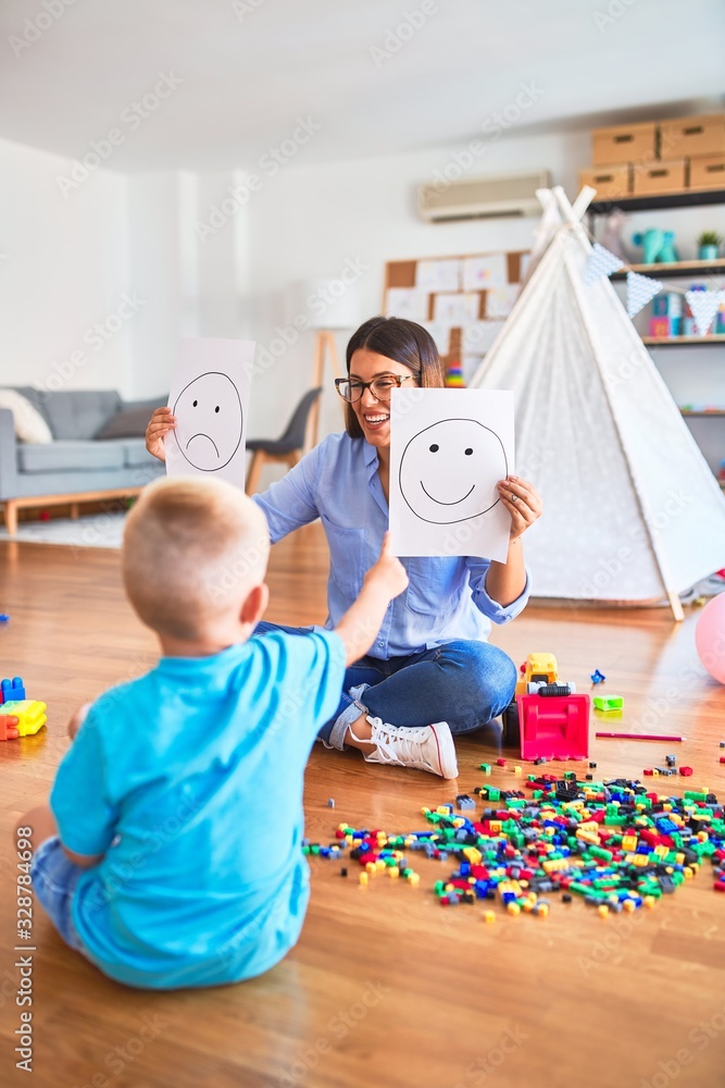 Young therapist woman speaking with child, counselor and behaviour ...