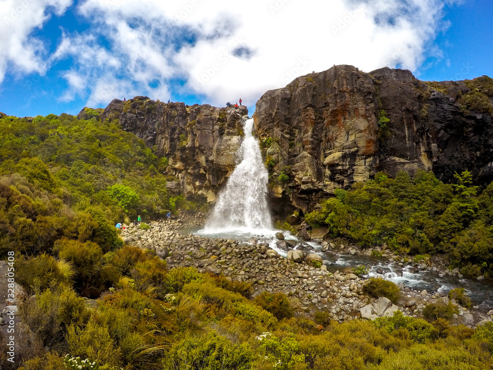 Taranaki waterfall at Taranaki Falls walking/hiking Trail in summer ...