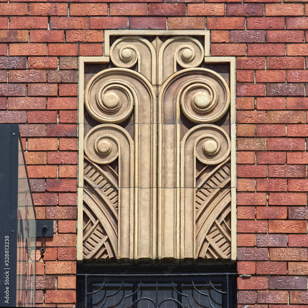 Art Deco architectural feature on the facade of an old pub. Decorative ...