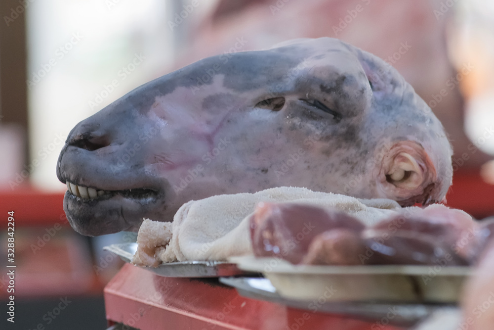Sheep head in buther aisle of Food market (bazaar). Bukhara, Uzbekistan ...