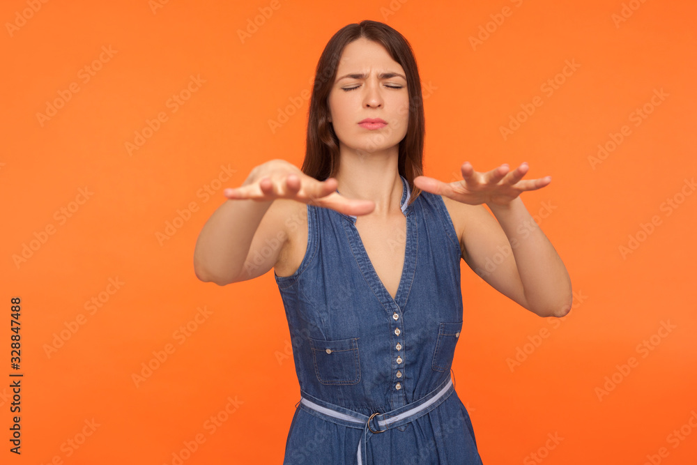 Vision problems. Disoriented young brunette woman in denim dress ...