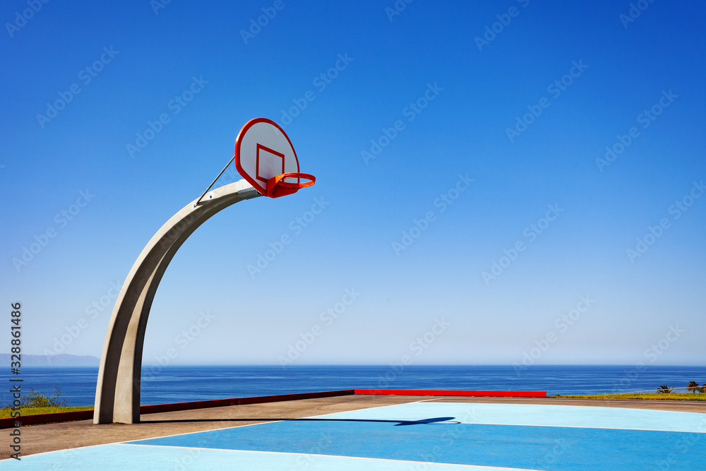 View basketball court ground with sea on background at Angel Gate Park ...