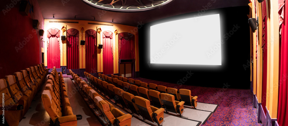 Cinema theater screen in front of seat rows in movie theater showing ...