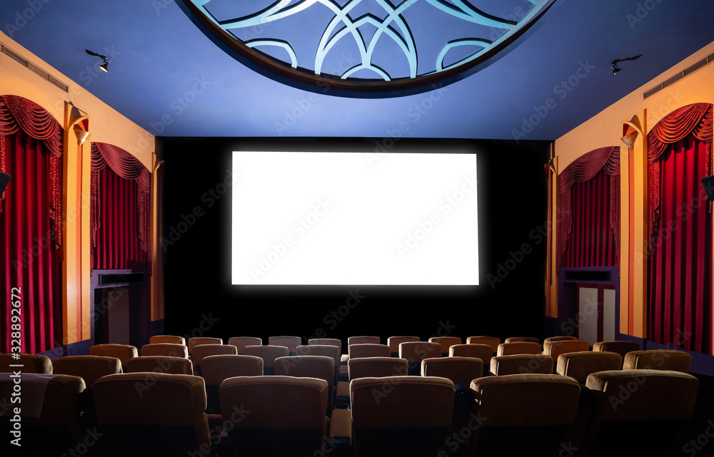 Cinema theater screen in front of seat rows in movie theater showing ...