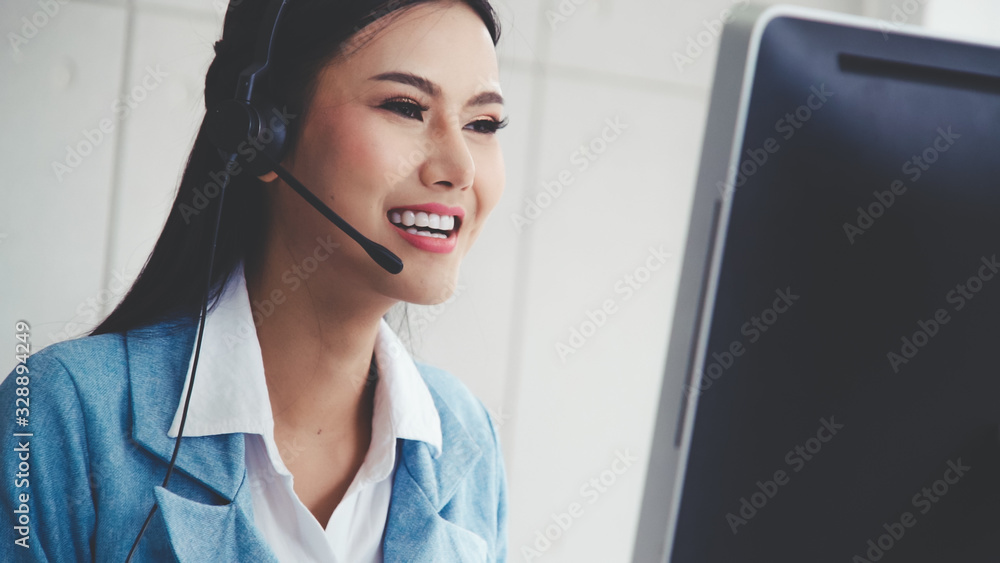 Foto de Customer support agent or call center with headset works on ...