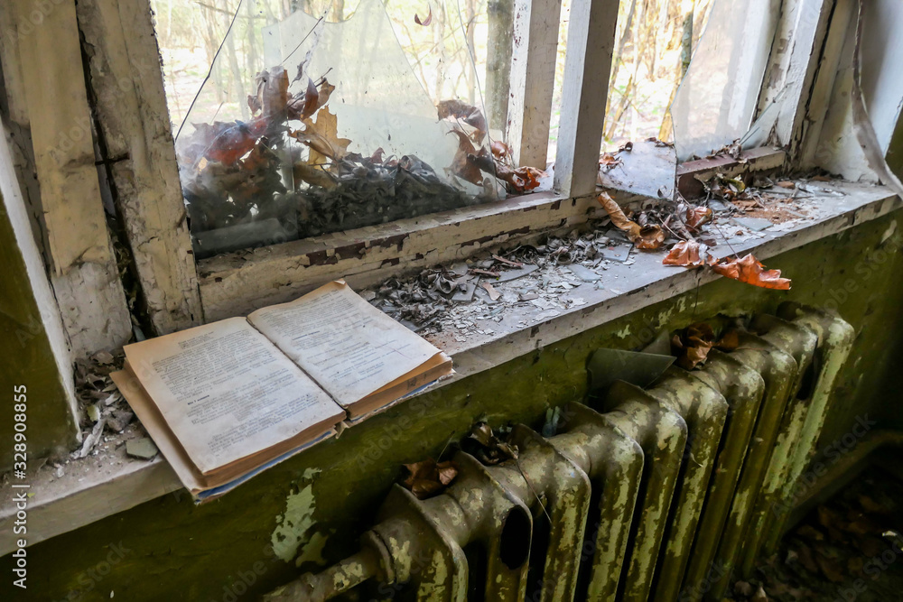 Fotografia do Stock: An open book lying on a window ledge in an ...
