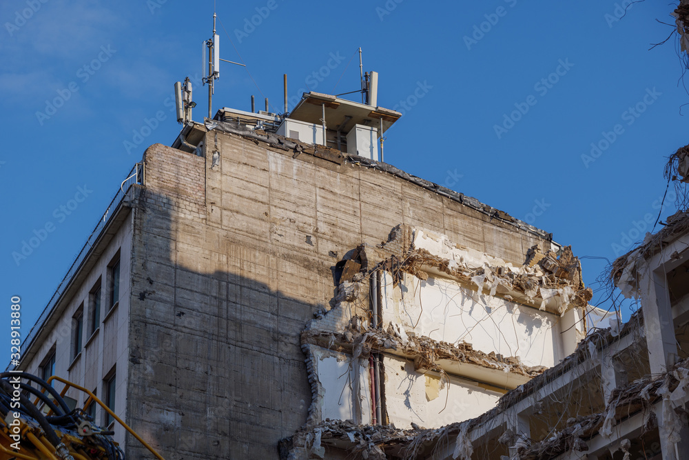 Partly office Building demolition. Demolished construction site in the ...