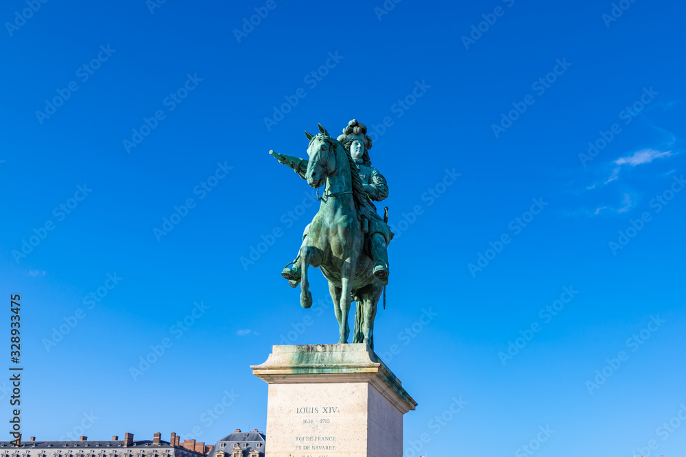 Monument by Louis XIV in front of Versailles Palace. Palace Versailles ...
