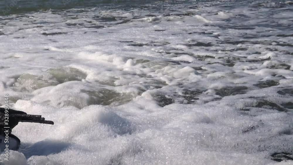 Water pollution. Dirty water from treatment plants flows through a pipe ...