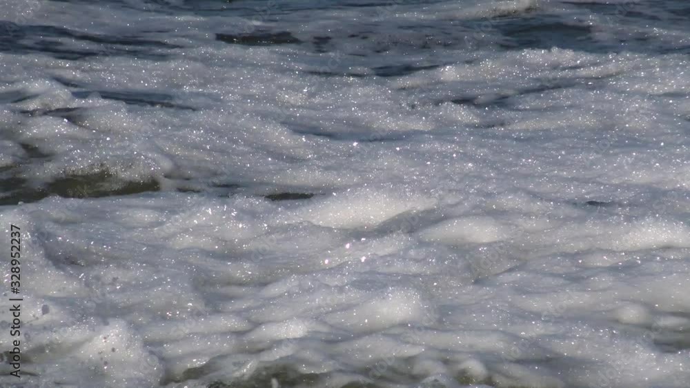 Water pollution. Dirty water from treatment plants flows through a pipe ...