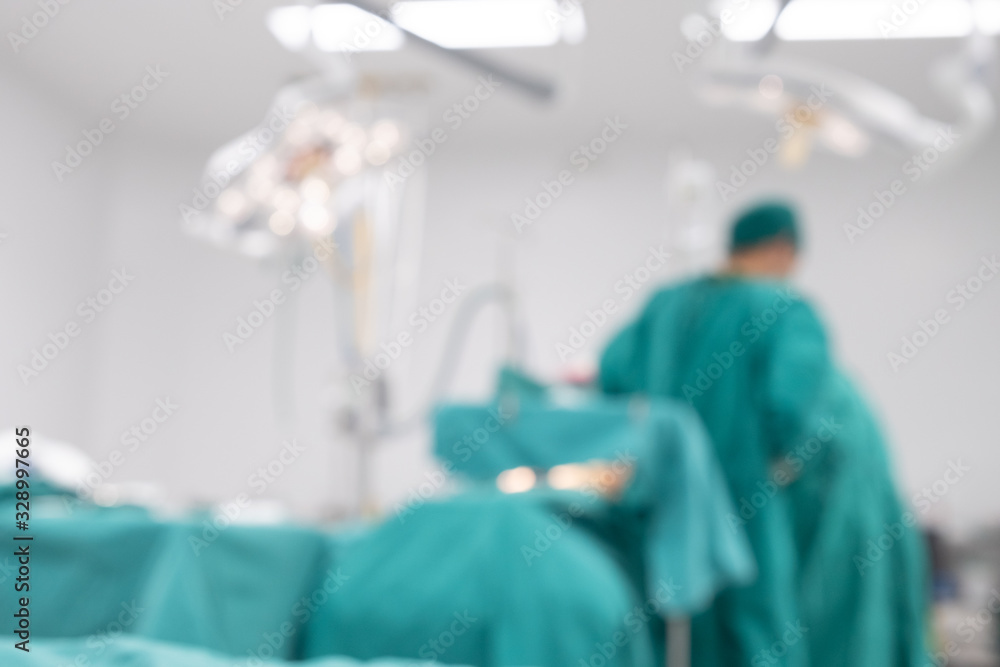 Blurred image background of medical team performing surgical operation ...