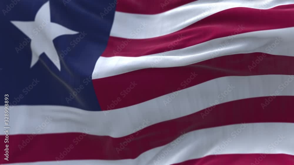4k Liberia National flag slow loop seamless waving with visible ...