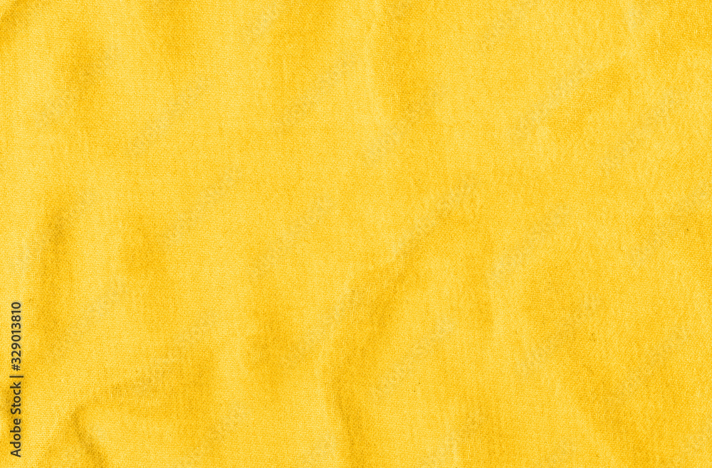 Vibrant yellow texture of binding fabric. Yellow textile background ...