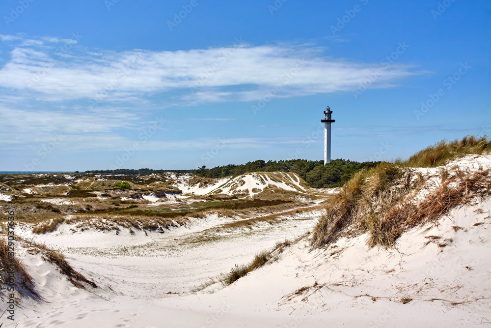 Dueodde Lighthouse (Dueodde Fyr) built in 1962 seen over sand dunes ...