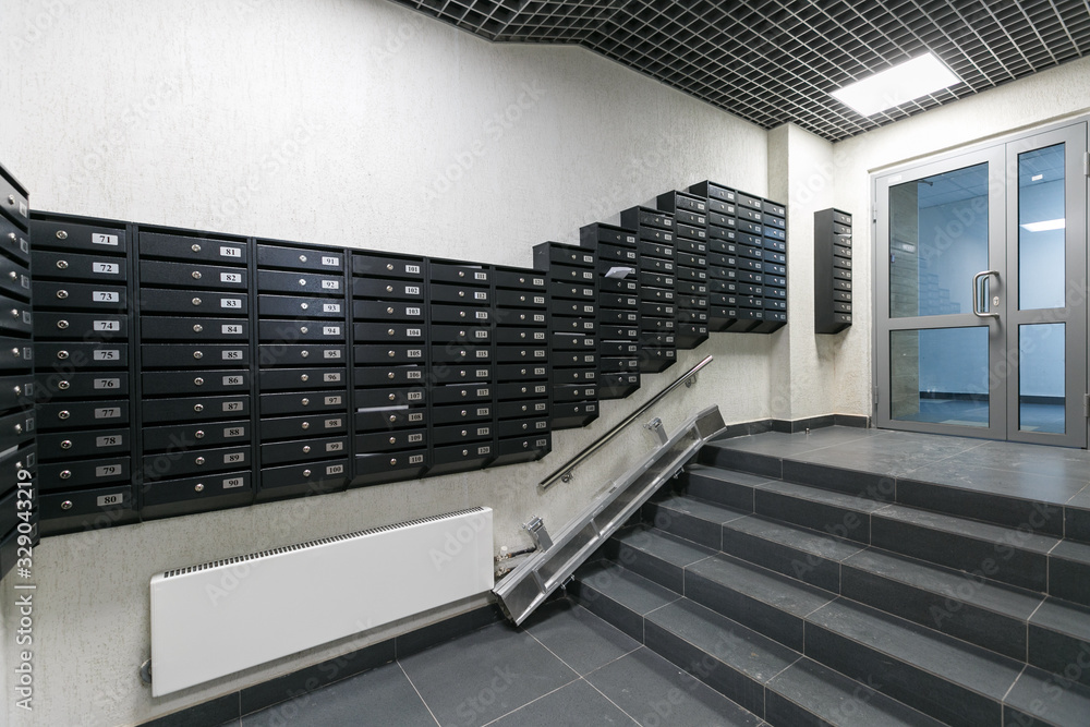 mailboxes in the lobby of an apartment building Stock Photo | Adobe Stock