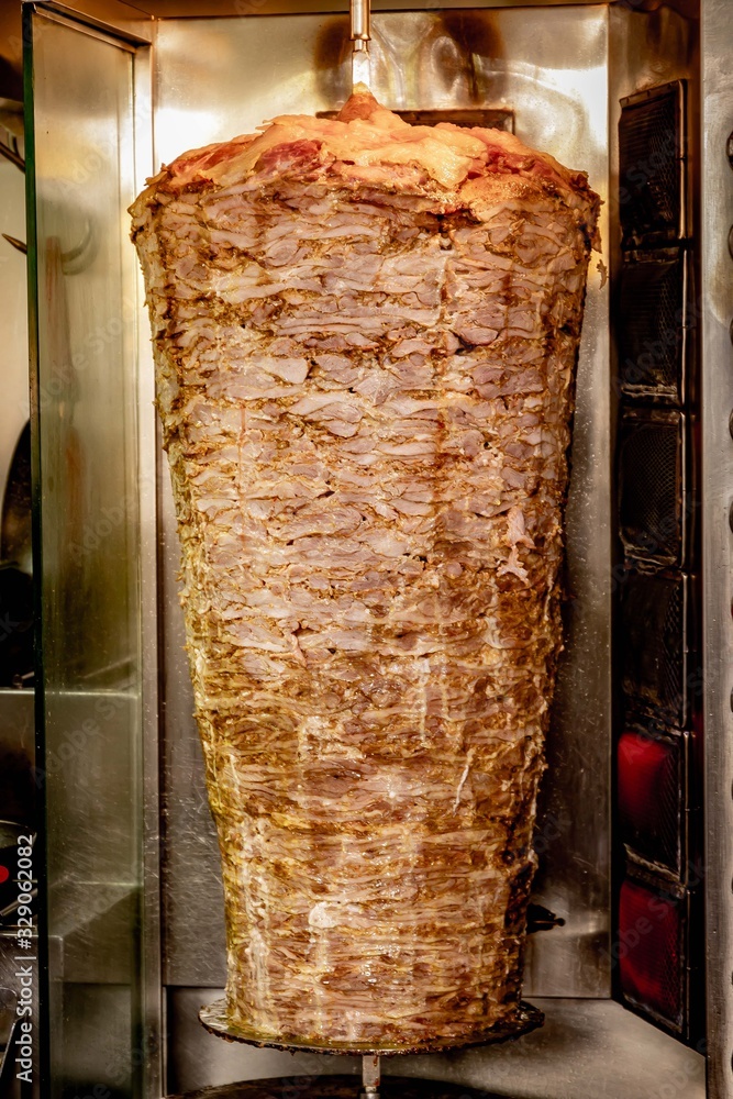Shawarma is a popular Middle Eastern street food made of lam Stock ...