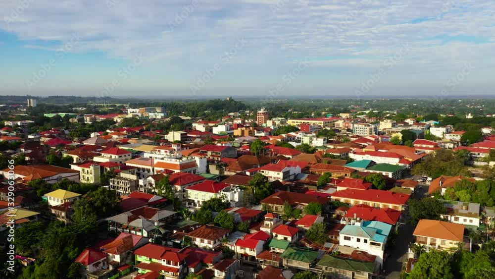 Vigan city in sunny weather, aerial view. Landscape with streets and ...