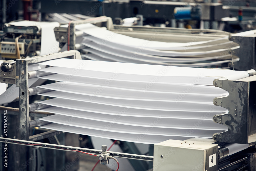 A toilet paper making machine producing toilet and bathroom paper rolls ...