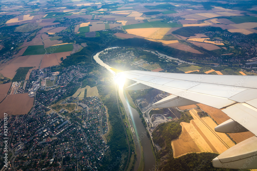 Airplane windows view above the earth on landmark down. View from an ...
