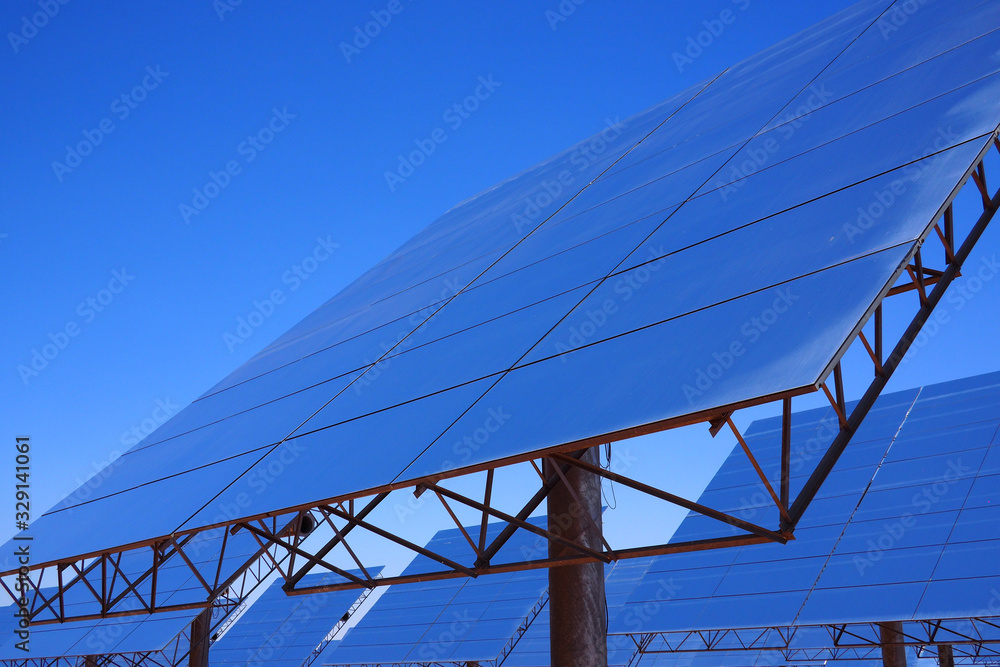 Reflective panels in a solar thermal power plant Stock Photo | Adobe Stock