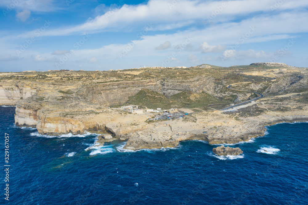 Dwejra is a lagoon of seawater on the island of Gozo. Aerial view of ...