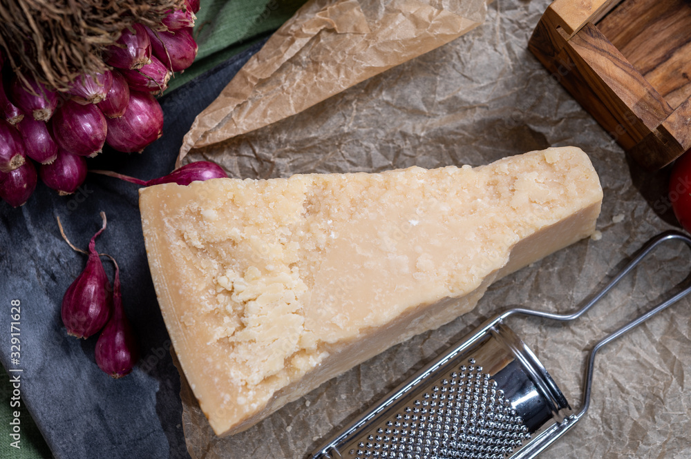One piece of authentic Parmigiano-Reggiano or Parmesan Italian hard ...