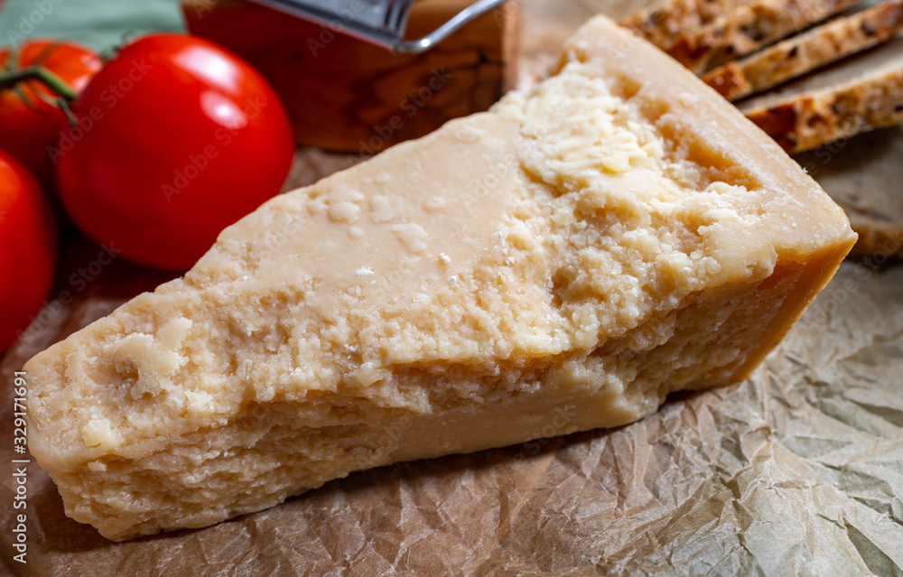One piece of authentic Parmigiano-Reggiano or Parmesan Italian hard ...