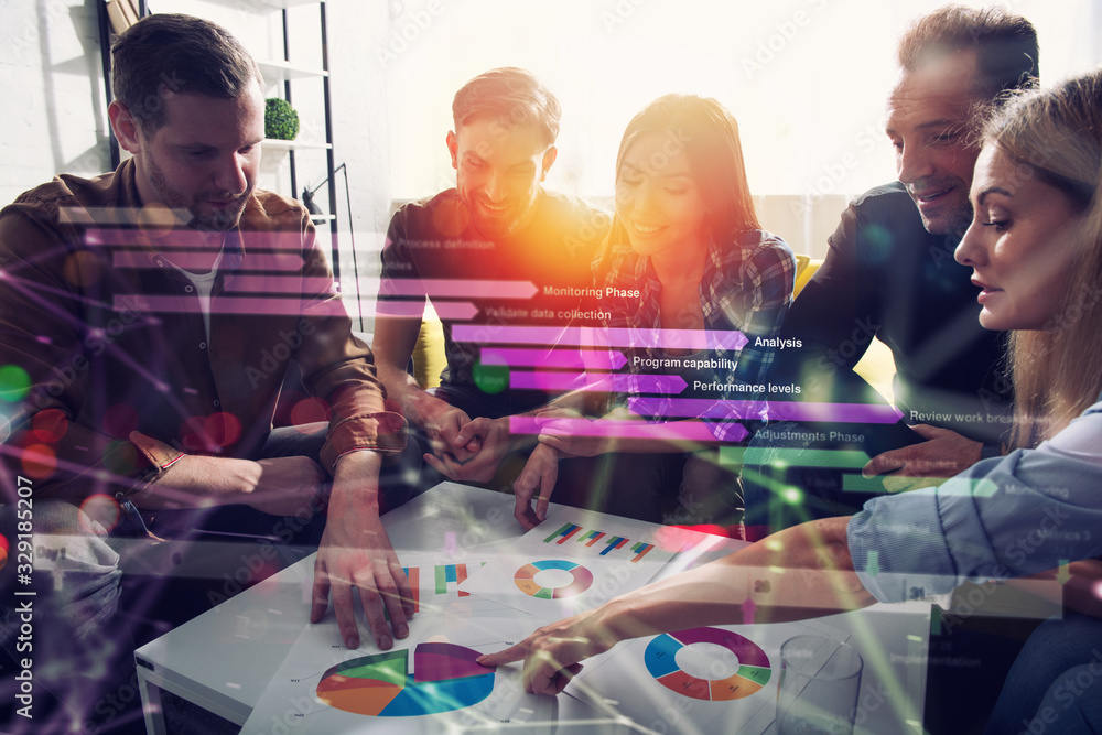 Team of people work together in office with company statistics. Concept ...
