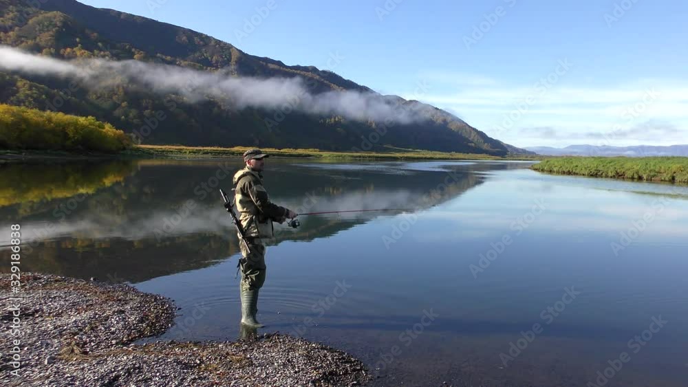Fishing by means of spinning on the rivers on the Kamchatka Peninsula ...