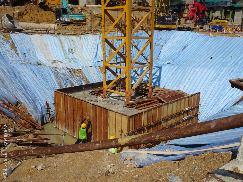 Pile cap and column stump under construction at the construction site ...