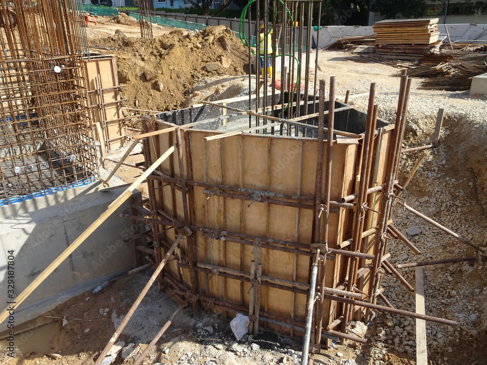 Pile cap and column stump under construction at the construction site ...