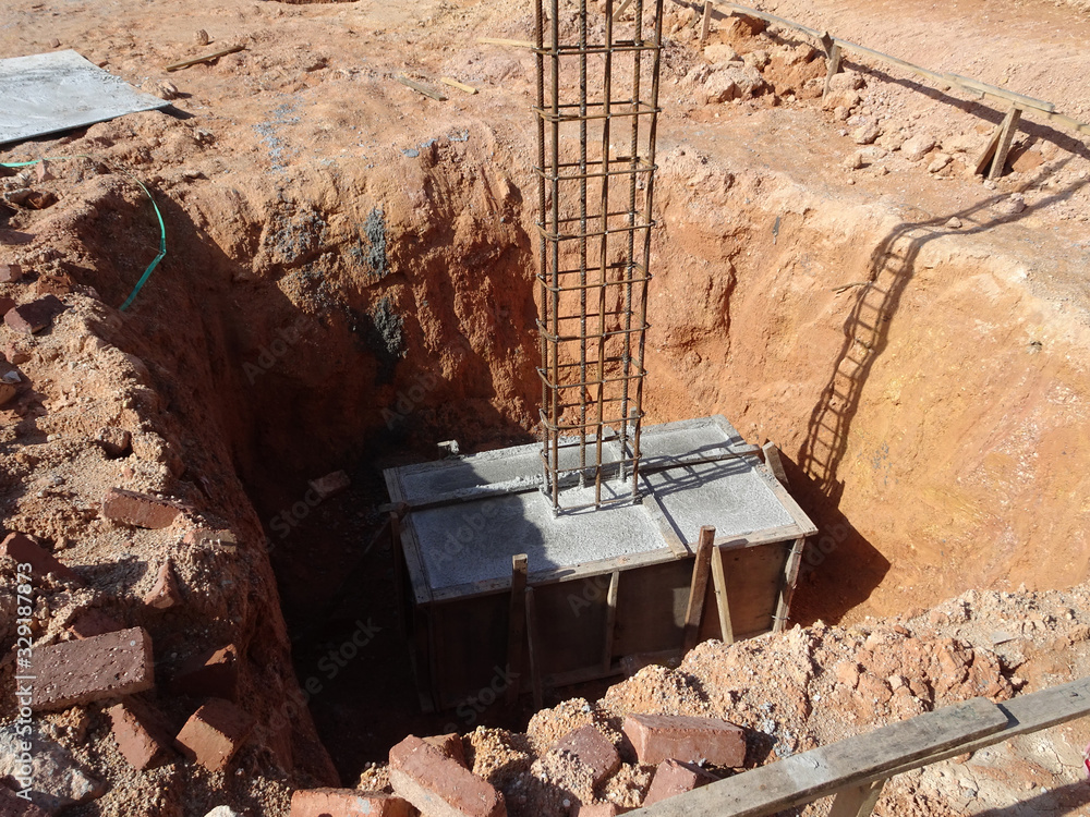 Pile cap and column stump under construction at the construction site ...