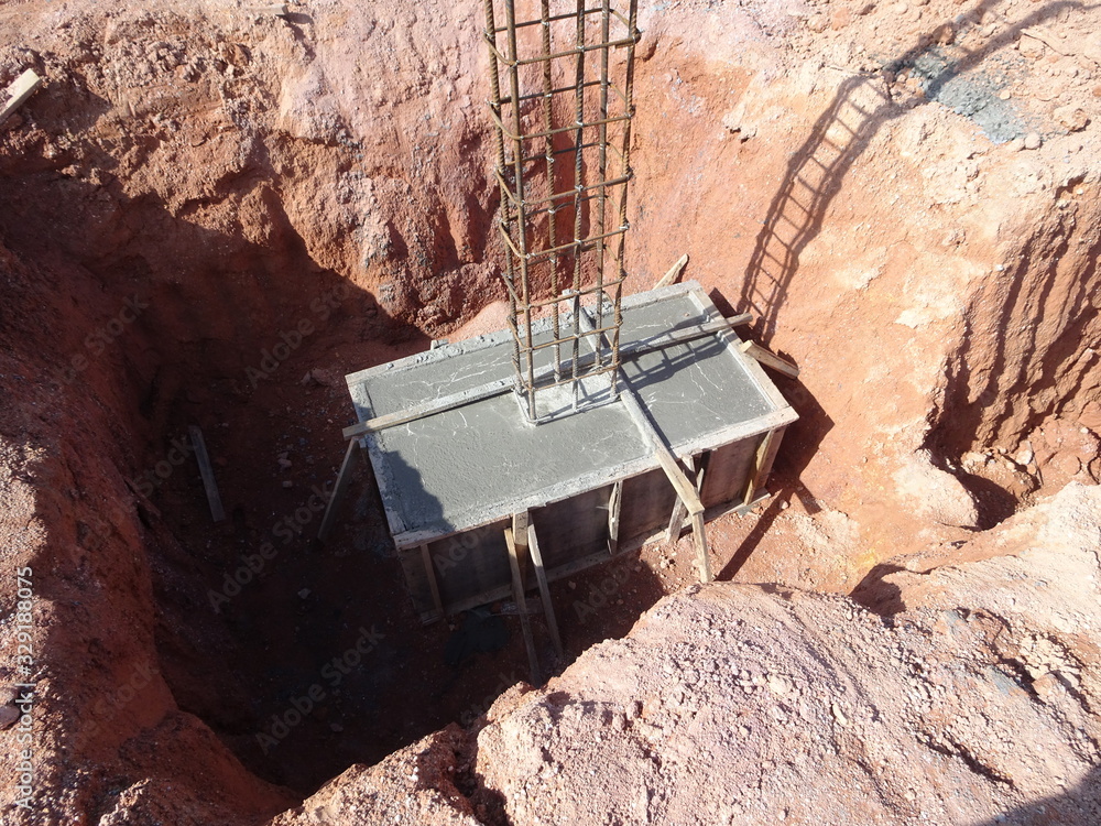 Pile cap and column stump under construction at the construction site ...