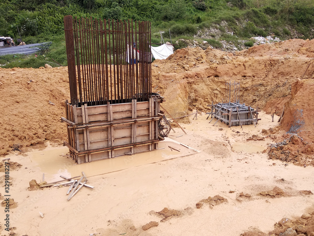 Pile cap and column stump under construction at the construction site ...