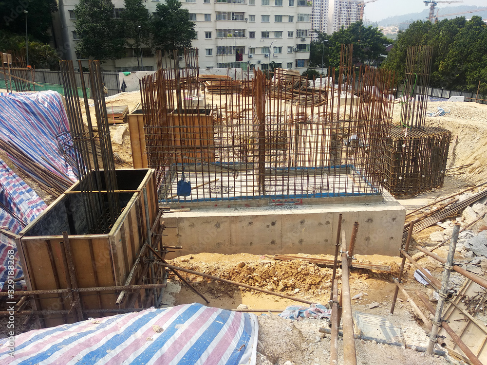 Pile cap and column stump under construction at the construction site ...
