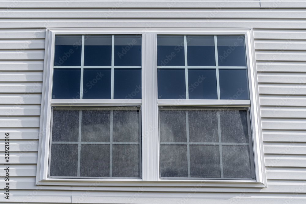 Double hung window with fixed top sash and bottom sash that slides up ...