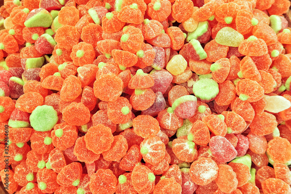 Flat top view of multicolored chewing marmalade. Texture of dessert ...