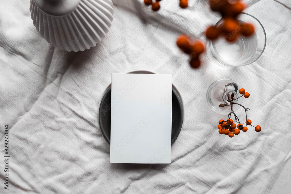 Ceramic table setting with rowan berries mock up top view. Holiday table setting mockup ...