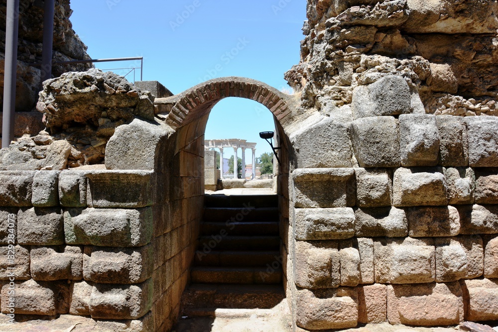 Roman ruins of an arch, wall and columns Stock Photo | Adobe Stock