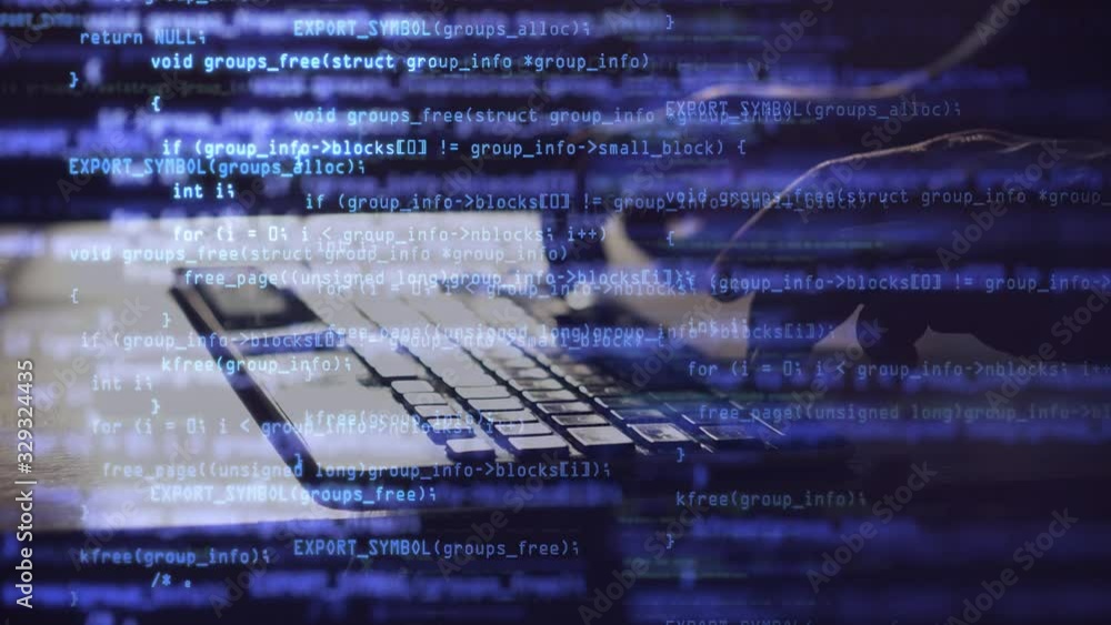 Male hands types program code on keyboard. Blue source code overlay ...