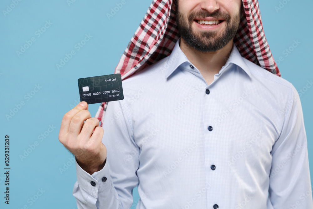 Cropped image of young bearded arabian muslim man in keffiyeh kafiya ...