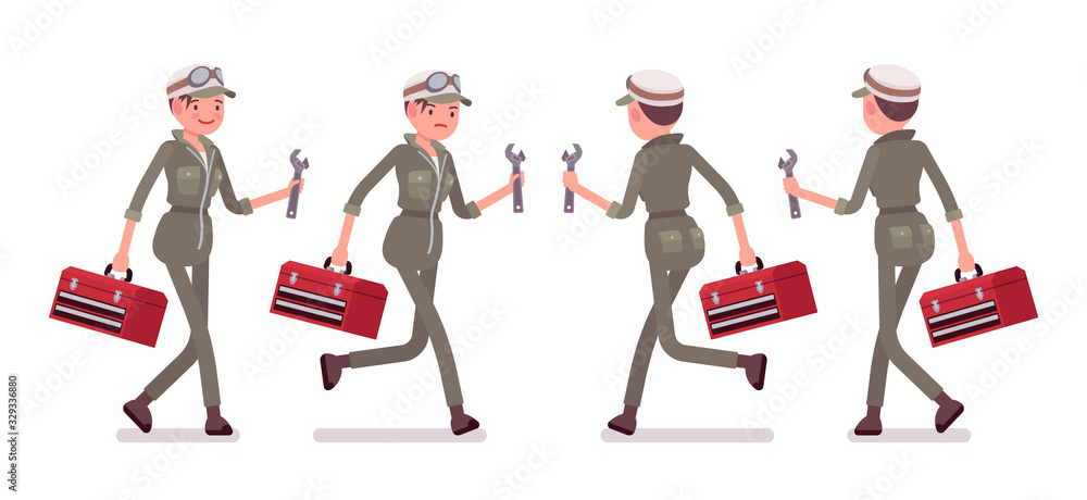 Mechanic girl in overalls with a toolbox. Attractive female skilled ...