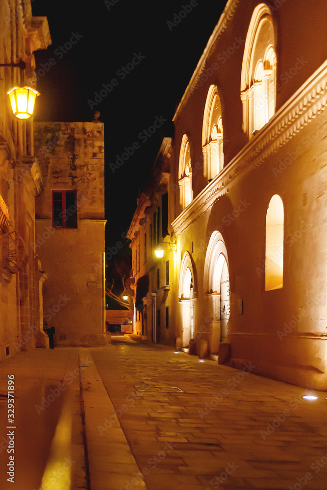 Illuminated streets of Mdina, ancient capital of Malta. Night view on ...