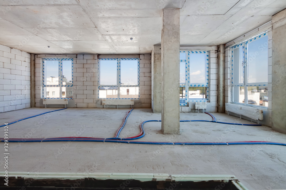 Construction site of residential apartment building interior in ...