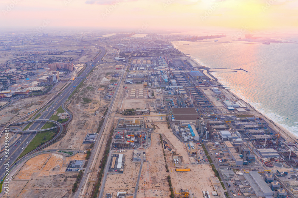 Aerial view of petrochemical oil refinery and sea in industrial ...