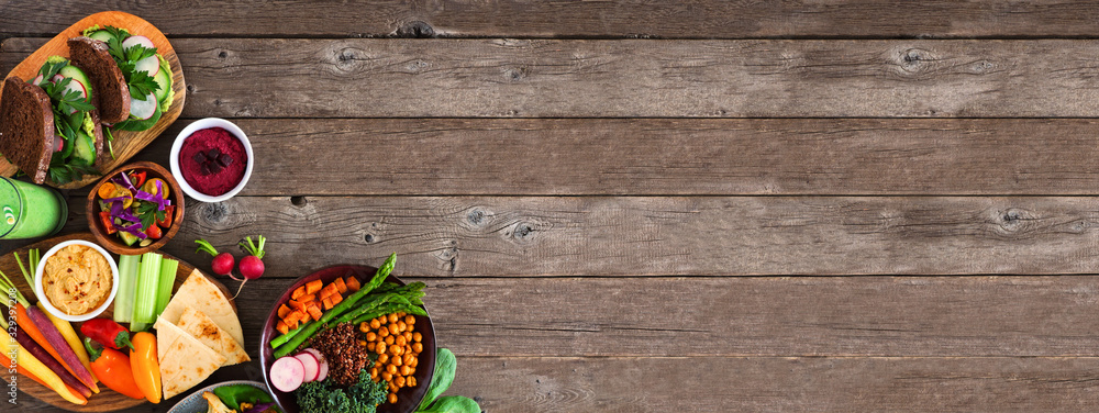 Healthy lunch food corner border. Table scene with nutritious ...