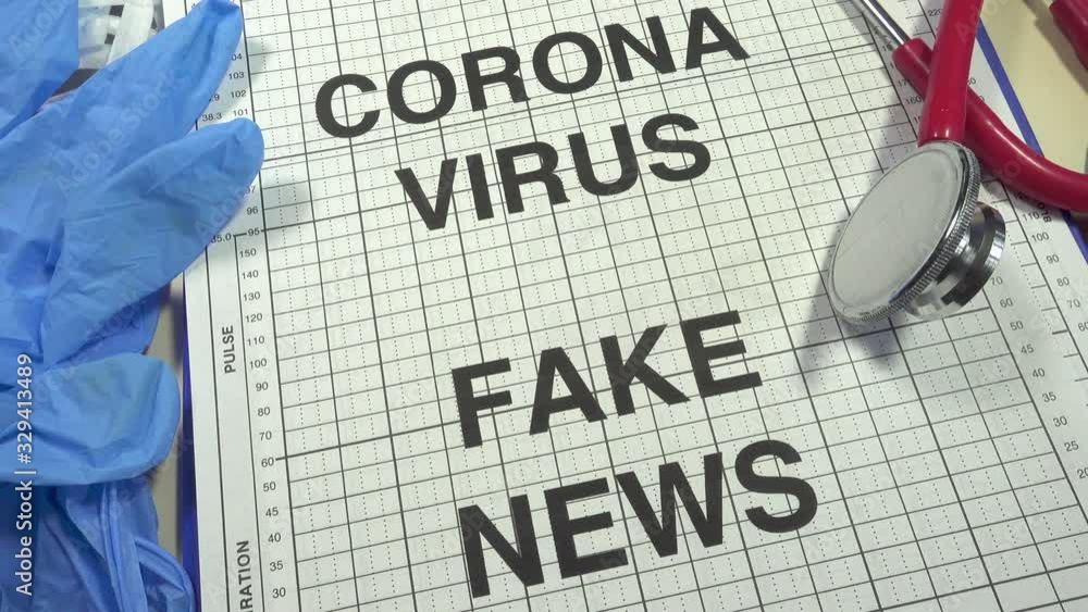 Tilt down over a Coronavirus, Covid-19 fake news danger warning ...