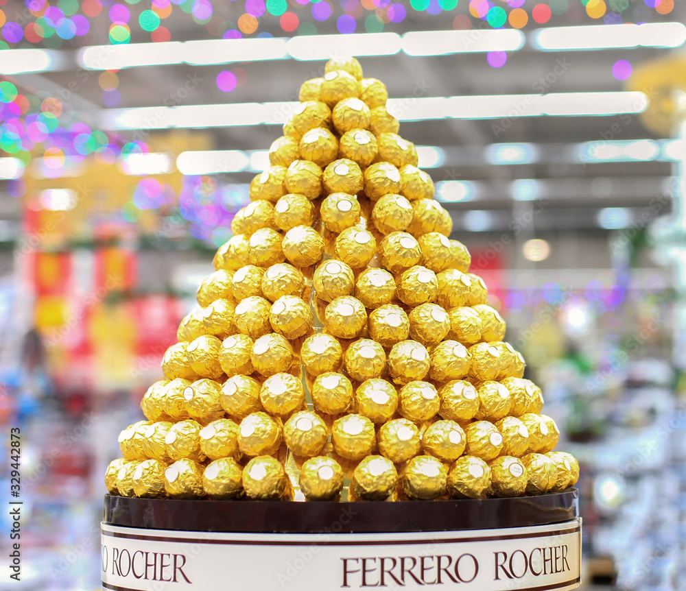 Kiev, Ukraine - November 29, 2019. Pyramid from Ferrero Rocher candies ...