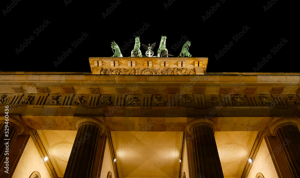 Brandenburg gate (Brandenburger Tor) at night in Berlin, Germany. The ...